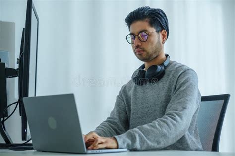 Asian Man Prompt Engineer Develop Coding App With Software Data Sitting