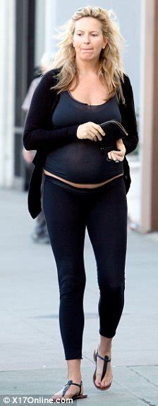 Penny Lancaster Gives Her Bump Room To Grow In Lycra Daily Mail Online