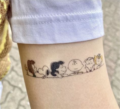 Pin On Tattoos Und Piercings Snoopy Tattoo Tattoos For Women Wrist