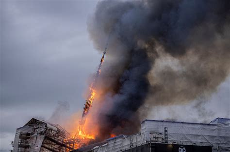 Old Copenhagen Stock Exchange Engulfed In Fire Spire Collapses Daily