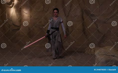 Cosplayer Girl Portrays Character Rey Skywalker From The Star Wars