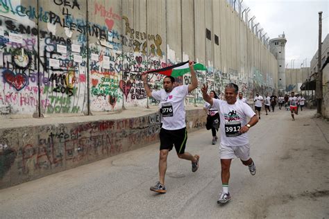 بالصور 6 آلاف متسابق يشاركون فى ماراثون فلسطين الدولى الخامس اليوم