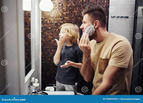Father And Son Shaving In Bathroom Side View Stock Image Image Of