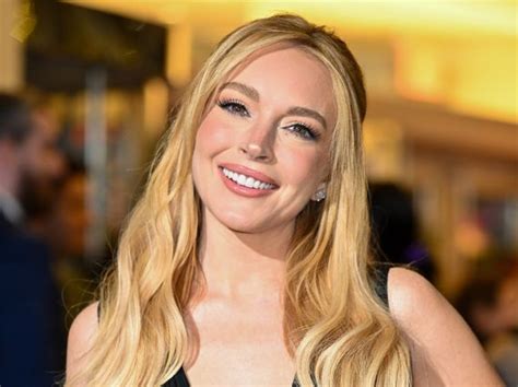 Lindsay Lohans Plunging Black Slit Dress At Cinemacon