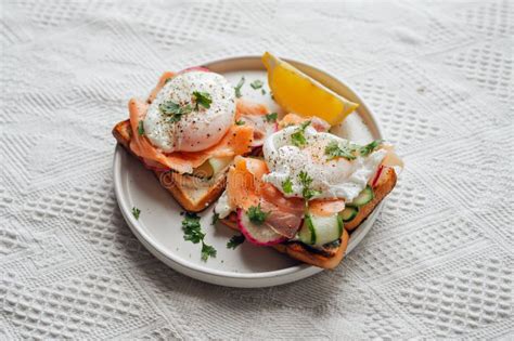 Breakfast Toast Cucumber Salmon Poached Eggs And Vegetables Stock