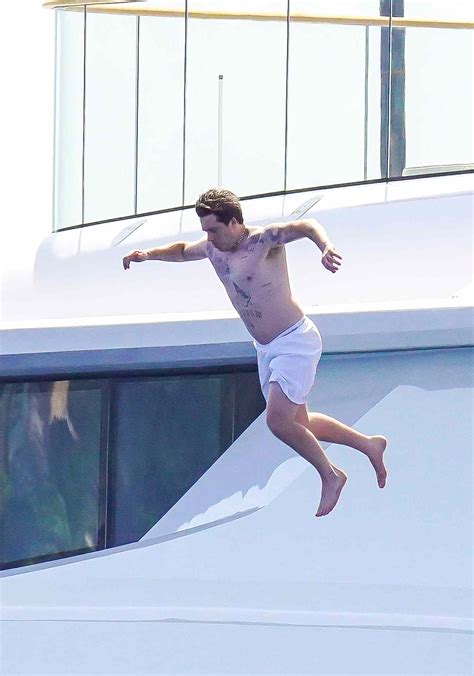 Shirtless Brooklyn Beckham Jumps Off Yacht While Vacationing With