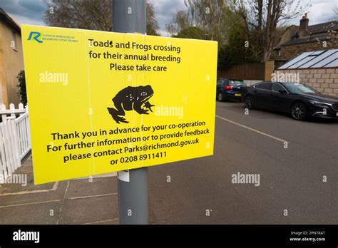 Warning Sign Signage To Warn People To Take Care At Frog And Toad