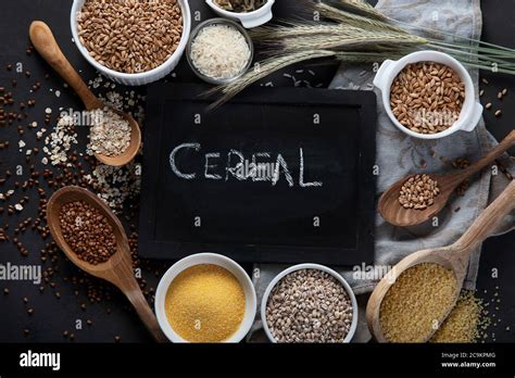 Different Types Of Cereals In Bowls On Black Background Healthy Nutrition Eating Top View