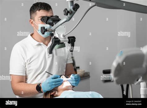 A Meticulous And Highly Qualified Dentist Carefully Examines Each