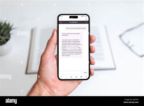 Hand Holding Ai Assistant App On Smartphone Helping Organize Daily
