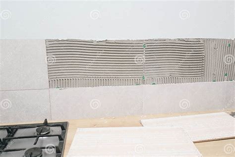 A Tile Has Fallen Off The Wall Incorrect Installation Of Porcelain Tiles Tiler Error Stock