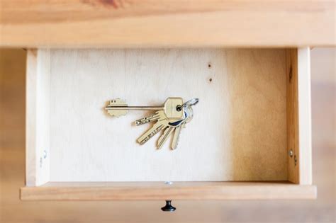 Premium Photo Bunch Of Door Keys In Open Drawer