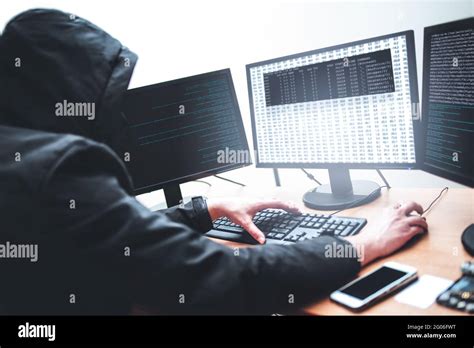 Hack Concept Picture Of Male Hacker Trying To Steal Information From System While Looking At