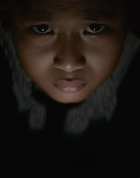 Premium Photo Close Up Portrait Of Scared Girl In Darkroom