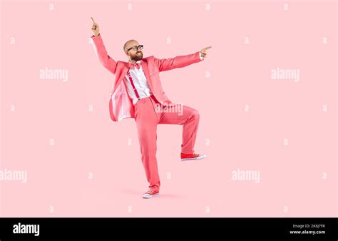 Funny Dancer In Pink Suit Trainers And Glasses Dancing And Having Fun