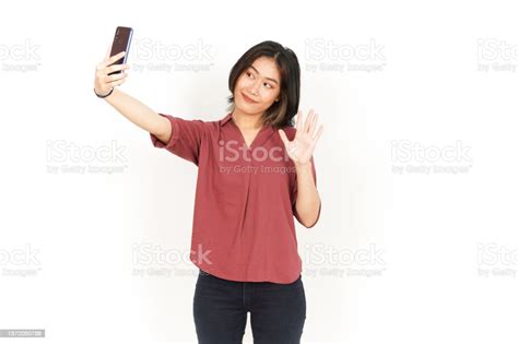 Take A Selfie Of Beautiful Asian Woman Isolated On White Background