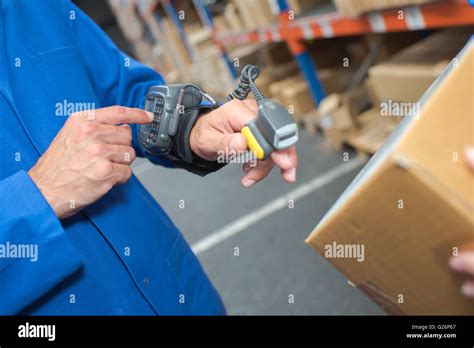 Man Using Wearble Barcode Scanner Stock Photo Alamy
