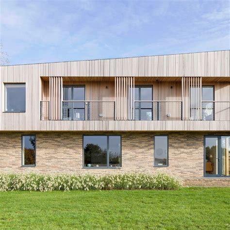 Special Blend Handmade Bricks With Weathered Larch Cladding