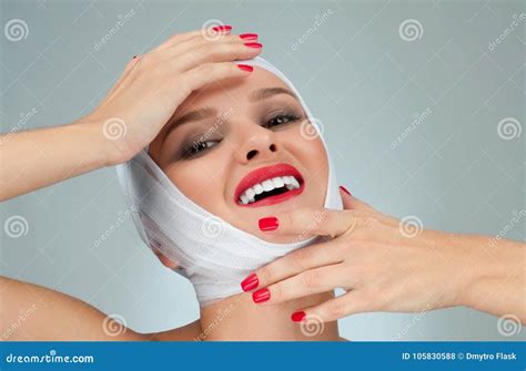 Beauty And Fashion Woman After Plastic Surgery With Bandaged Face