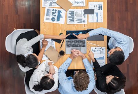 Panorama Top View Diverse Analyst Team Analyzing Financial Data