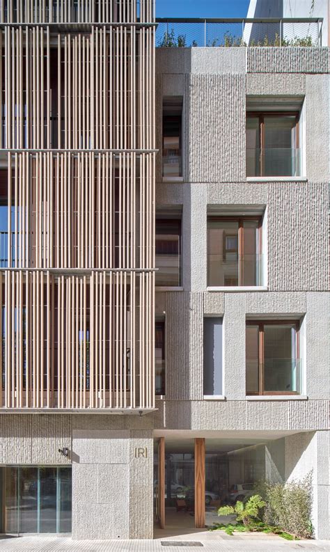Wood Screens And Green Courtyards Define Apartment Block In Mallorca By