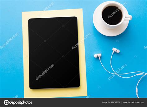 Top View Digital Tablet Blank Screen Cup Coffee Wired Earphones — Stock