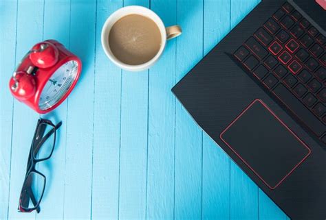 Premium Photo Clock With Glasses And Notebook