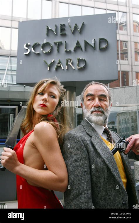 Models Playing The Roles Of Cluedo Characters Miss Scarlet And Colonel