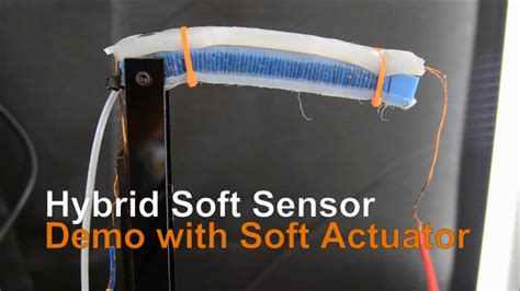 Hybrid Soft Sensor Demonstration With A Soft Actuator And A Rigid Robot