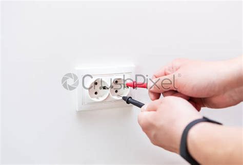 Measuring The Voltage In The Socket With A Professional Digital Stock Photo Crushpixel