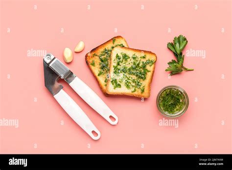 Composition With Slices Of Toasted Garlic Bread Ingredients And Press