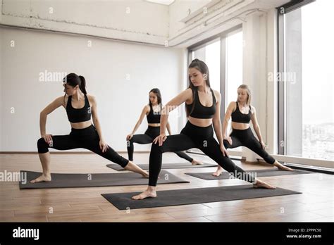 Beautiful Females In Black Tops And Pants Running Through Simple