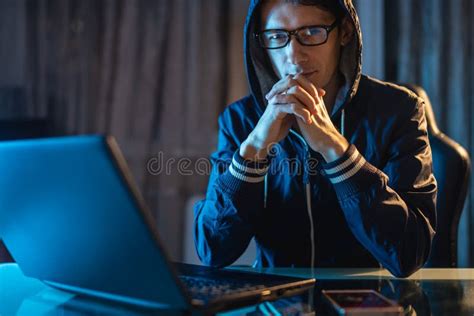 Man Looking In The Camera Hacker Attacks And Stealing Access Databases With Passwords Cyber