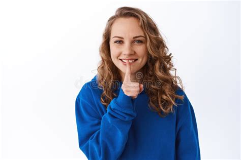Beautiful Smiling Girl Hushing Asking To Be Quiet With Happy Face