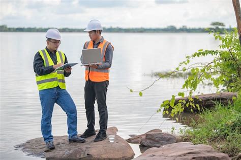 Premium Photo Environmental Engineers Inspect Water Qualitybring