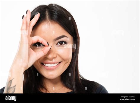 Photo Of Happy Young Asian Lady Standing Isolated Over White Background