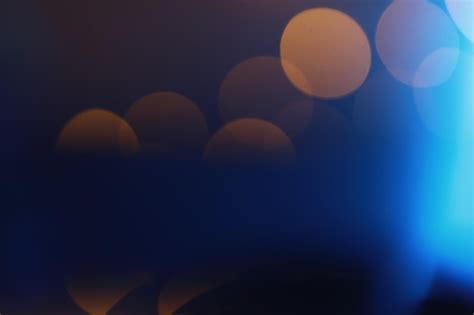 Premium Photo Abstract Bokeh Background Golden Bokeh Circles On Dark