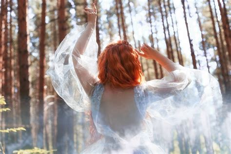 Beautiful Redhead Woman Forest Nymph Premium Photo