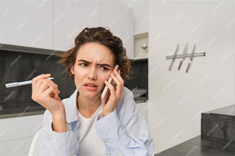 Premium Photo Portrait Of Woman Having Complicated Conversation