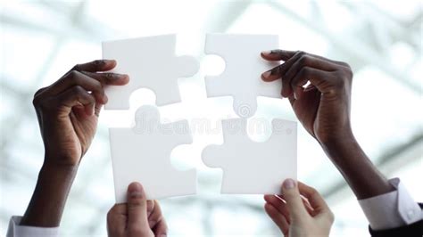 Four Hands Of Businessmen Put Together A Puzzle Stock Footage Video Of Agreements Creativity