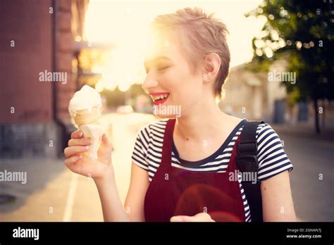 Pretty Woman Outdoors Eating Ice Cream Summer Sun Relaxation Stock