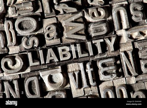 Old Lead Letters Forming The Word LIABILITY Stock Photo Alamy