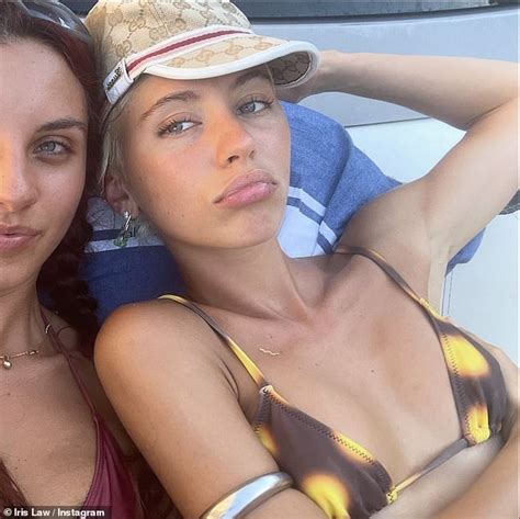 Iris Law Showcases Her Jaw Dropping Figure In Tiny Bikini As She Soaks