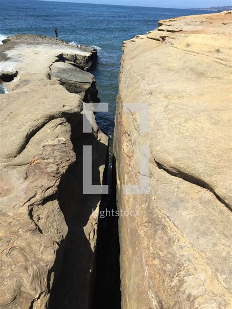 A Huge Crevasse In A Rocky Ocean Shore — Photo — Lightstock