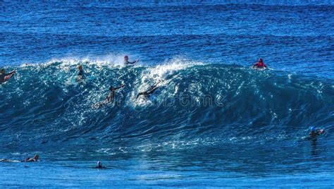 Colorful Surfers Party Wave Banzai Pipeline North Shore Oahu Hawaii