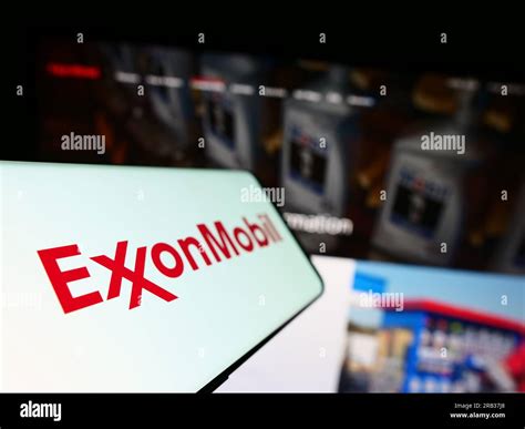 Mobile Phone With Logo Of American Petroleum Company Exxon Mobil