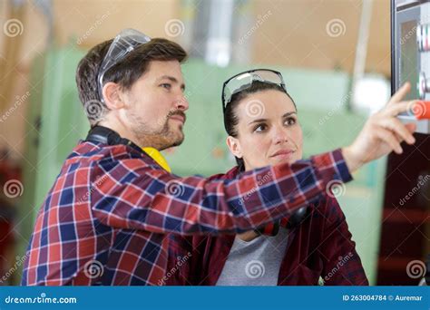 Man And Woman With Machine Cnc Stock Photo Image Of Metallurgy Plant 263004784