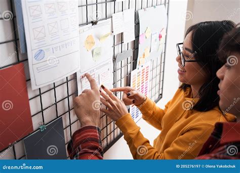 Specialists Creating A Prototype User Experience Interface Stock Image