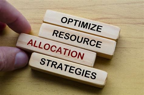 Optimize Resource Allocation Strategies Text On Wooden Blocks