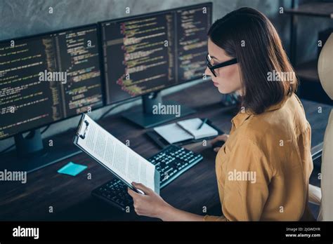Profile Side View Portrait Of Attractive Focused Girl Web Developer Reading Law Assignment